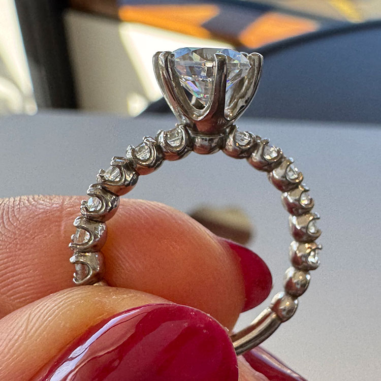 Lab round brilliant in six claw setting and diamond band | Temple ...
